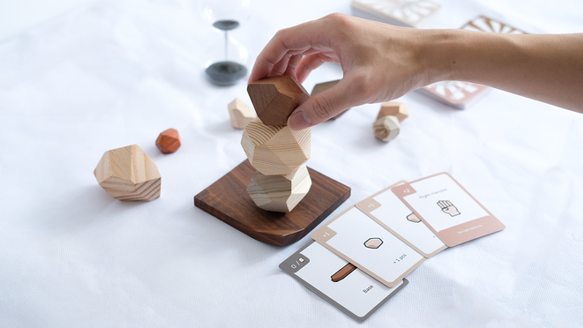 Junk Art combines with wood-work in dexterity game Moku Tower | Dicebreaker