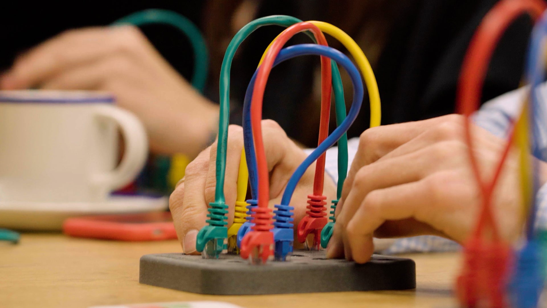 These puzzly board games are played with real-life internet cables ...