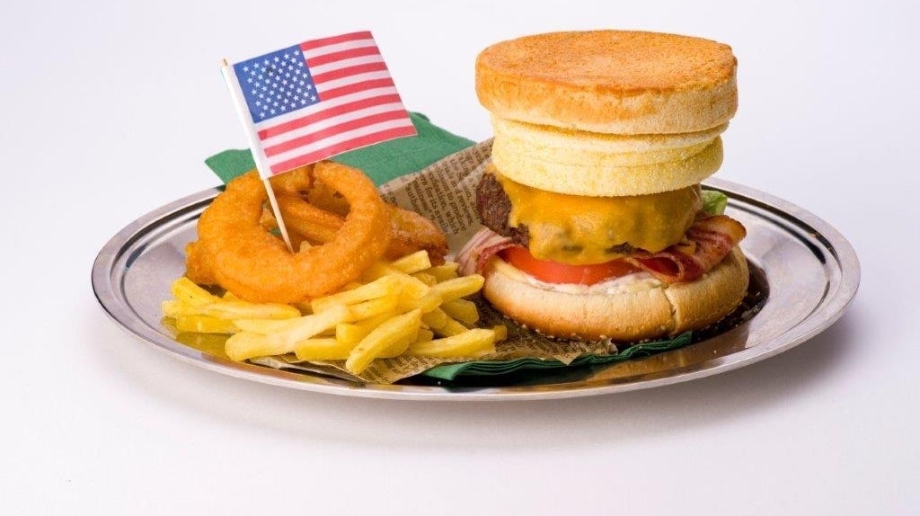 The Capcom Cafe has a flattop Guile burger and it looks amazing ...